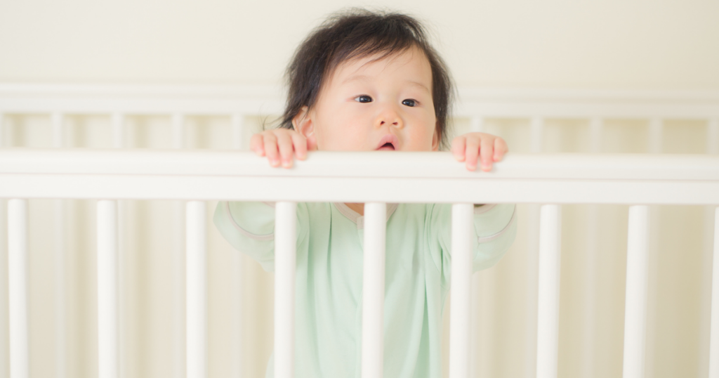 Baby Standing in Crib: Learn the Joys & Safety - Urban Parenthood
