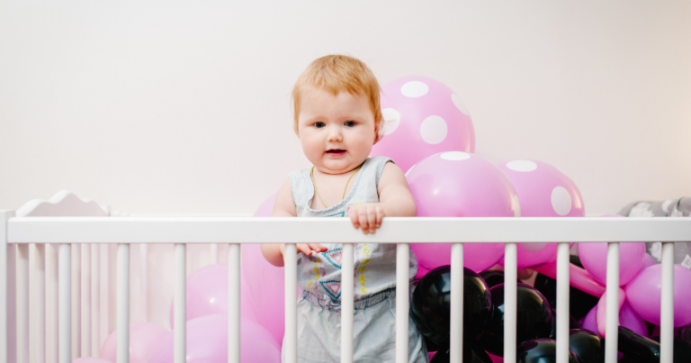 Baby Standing in Crib: Learn the Joys & Safety - Urban Parenthood